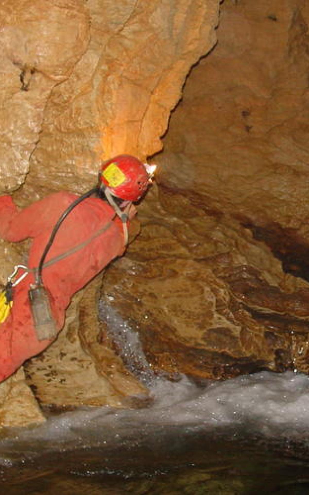 Introduction to caving: exploring a cave – underground river | Explore ...